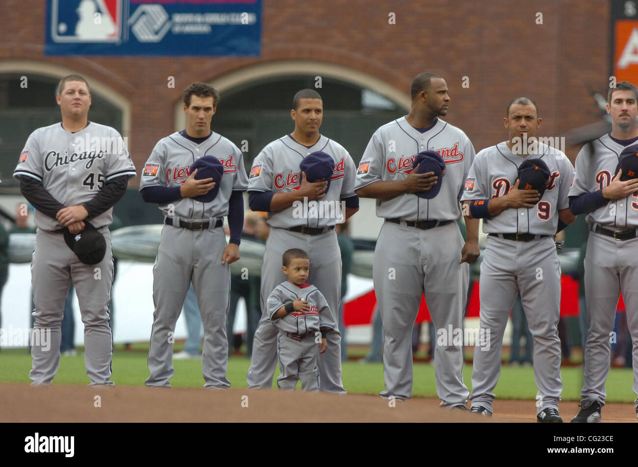 Clevelands Victor Martinez stands along with his son for the National ...