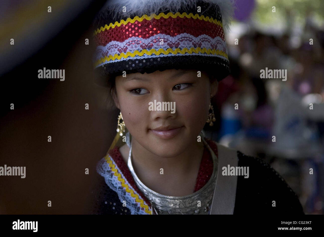 Carolyn Yang (cq-age 15) of Sacramento, California waits with her group ...