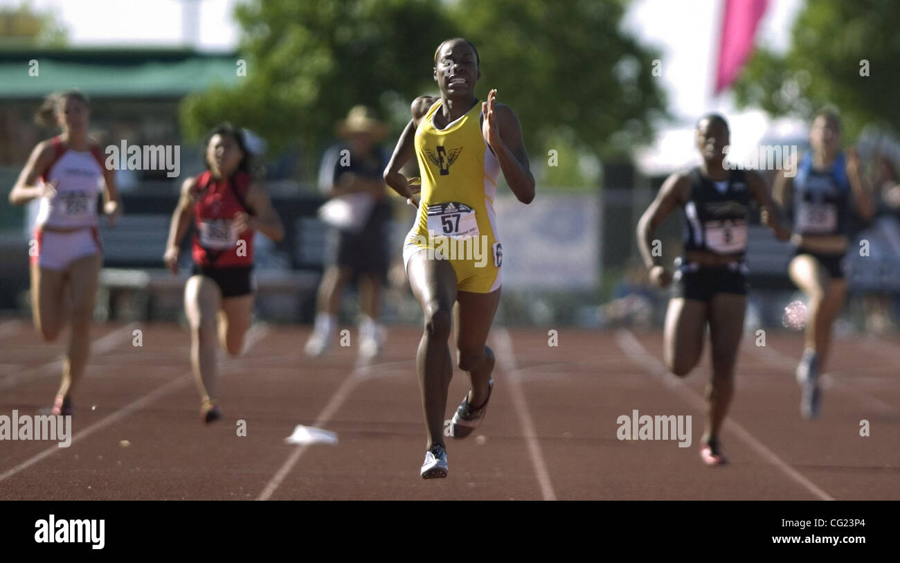 Jessica Beard (cq-center) of Euclid High School in Ohio ran 52.07 in ...