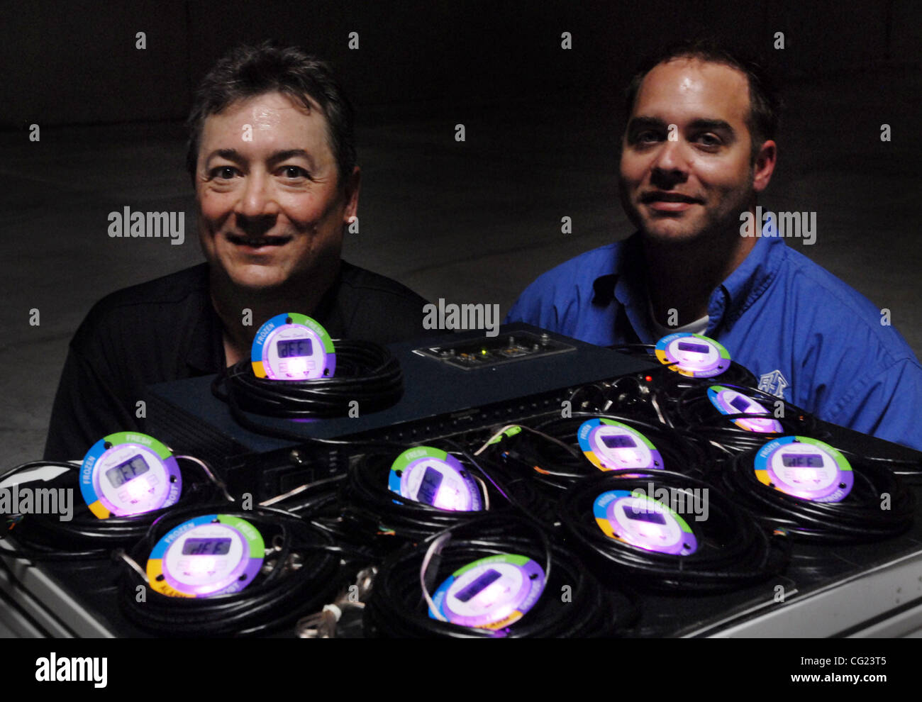 Phil Wiggins (cq, left) and Troy Tandy (cq) of Refrigeration Innovation ...