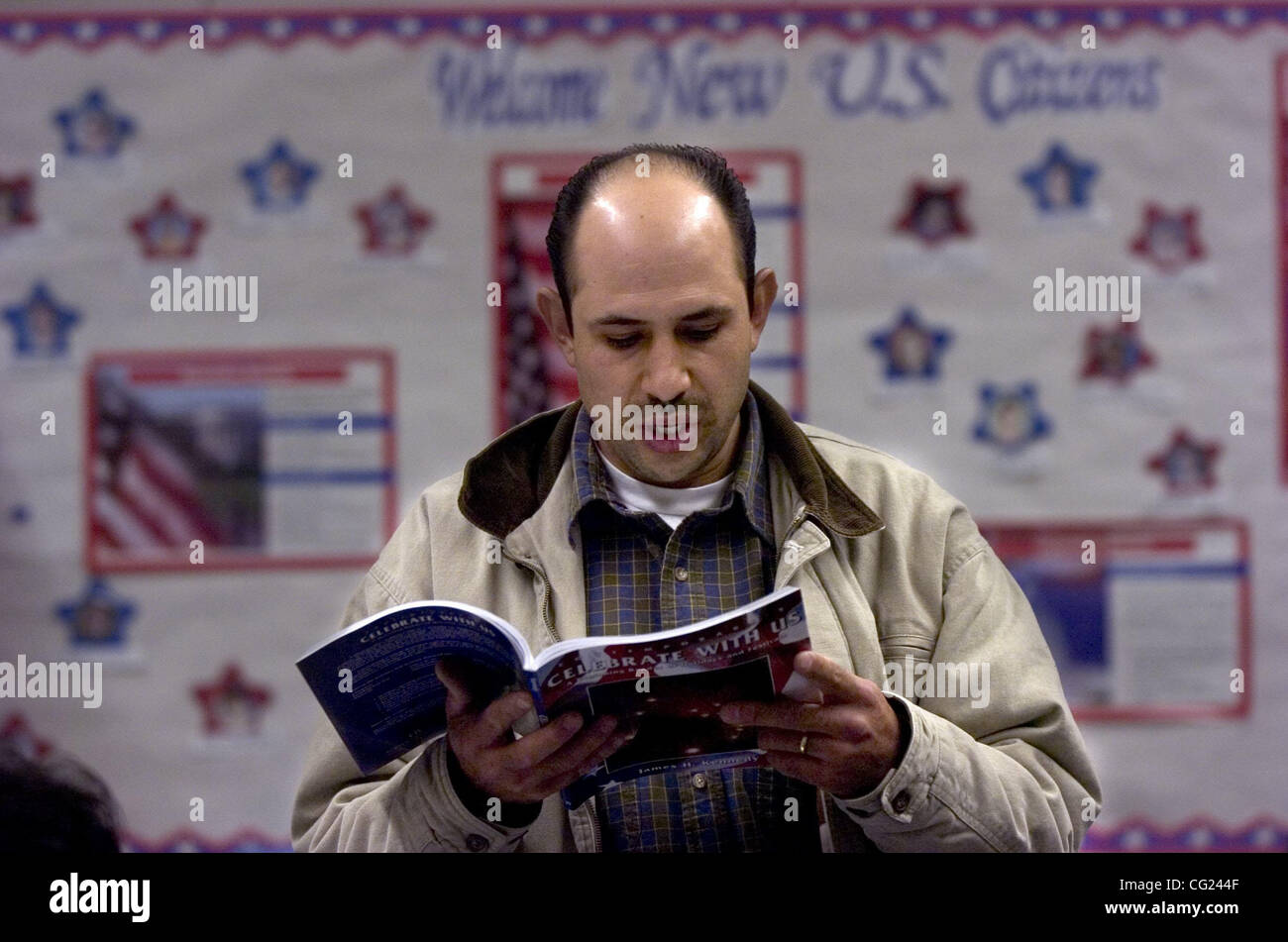 LEDE Luis Davalos, 35, of Sacramento, reads some text about civil ...