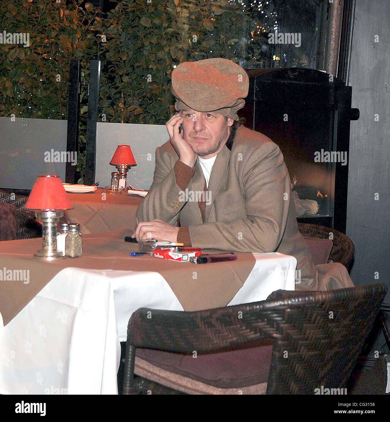 Chef Marco Pierre White takes a break and smokes a cigarette outside ...