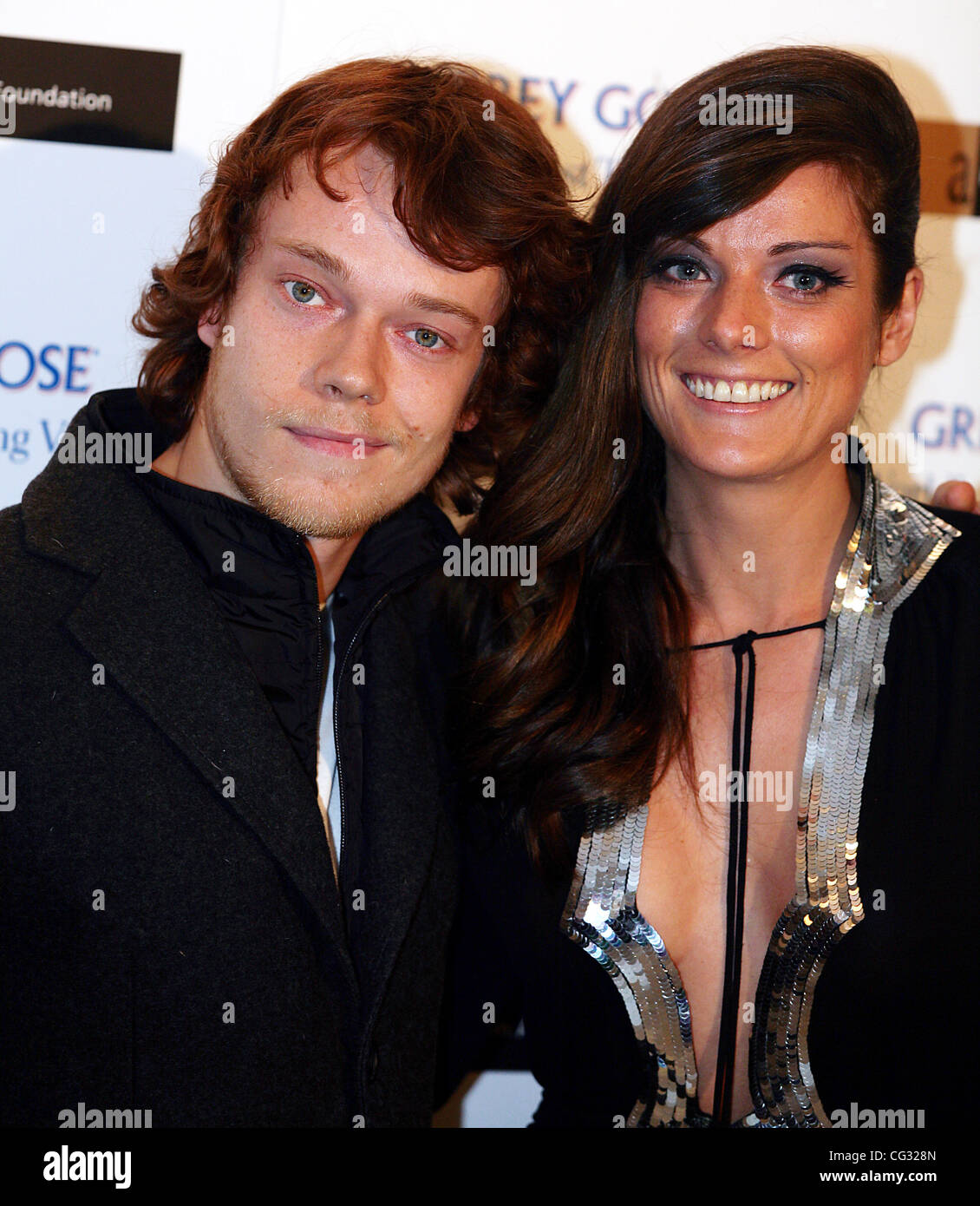 attending the The Elton John AIDS Foundation Winter Ball, London ...