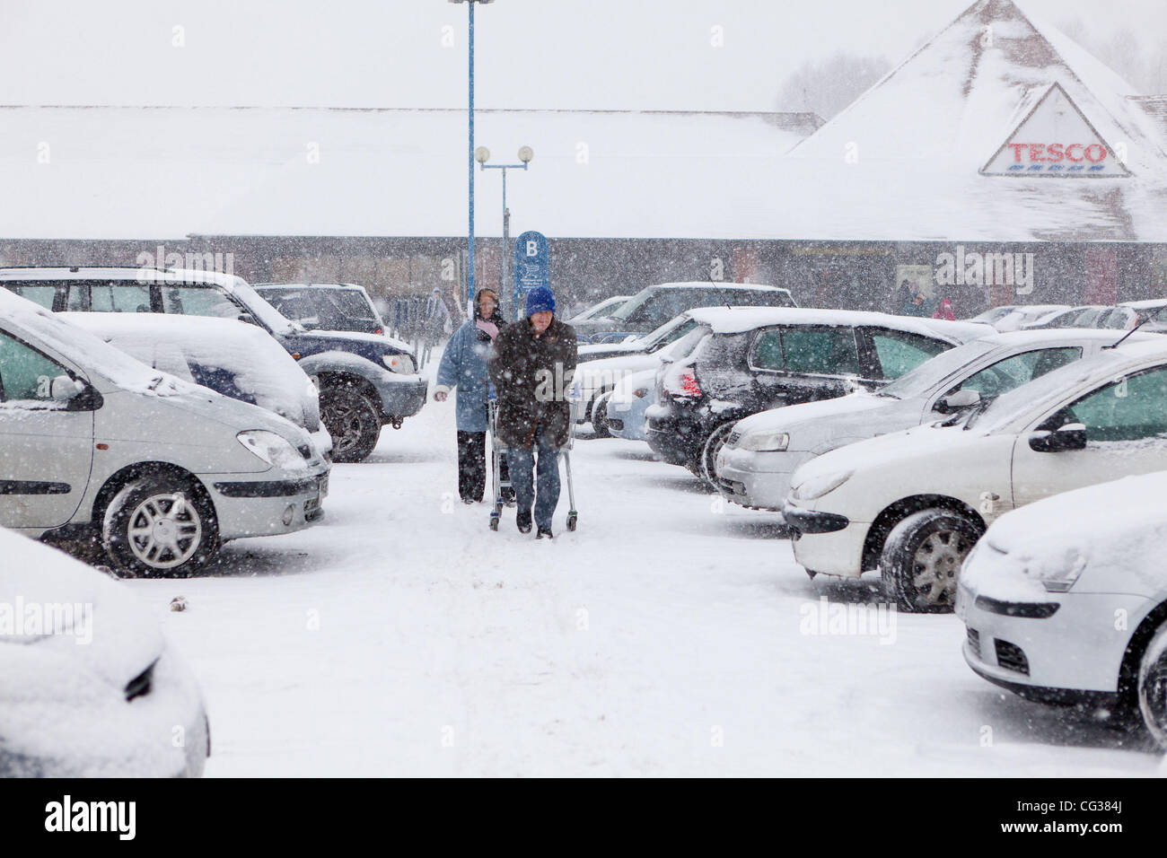 Snow scenes in Wales Shoppers brave the cold weather and heavy snow at ...