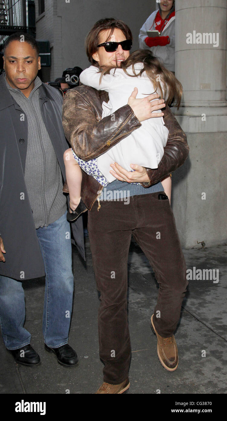 Tom Cruise carries his daughter Suri Cruise whilst out on a family ...