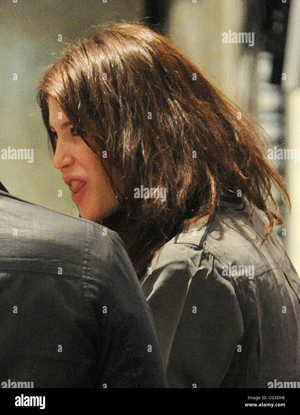 Gemma Arterton shares a rather animated conversation with friends ...