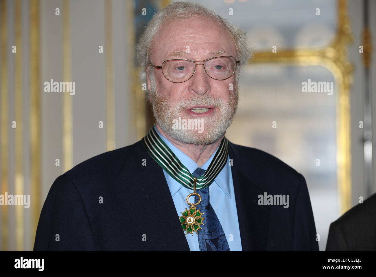 Michael Caine Sir Michael Caine receives the 'Insignia of Commander' in ...
