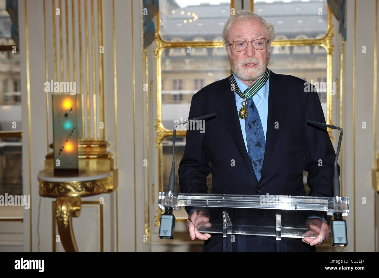 Michael Caine Sir Michael Caine receives the 'Insignia of Commander' in ...