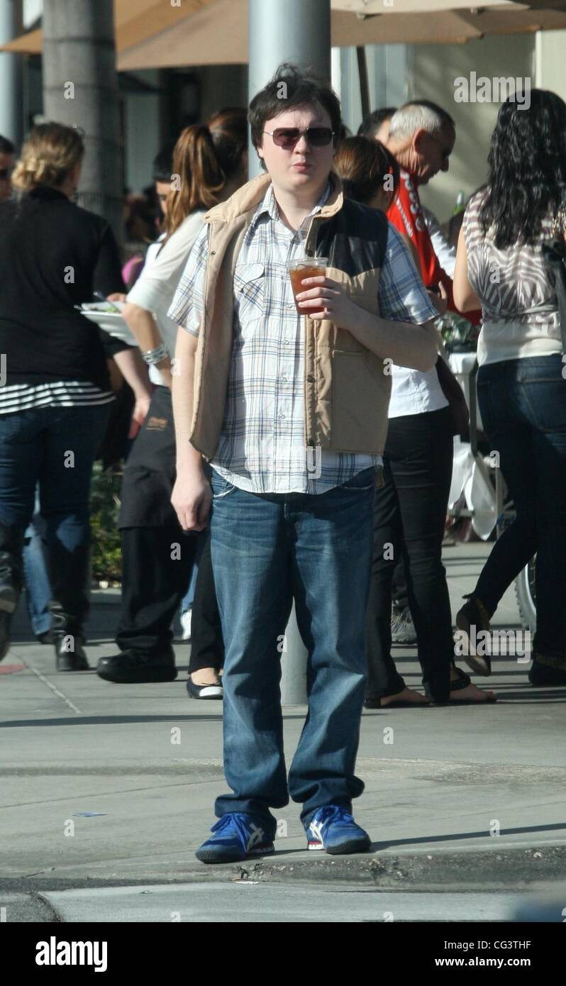 Clark Duke drinking an iced drink while out and about in Beverly Hills ...