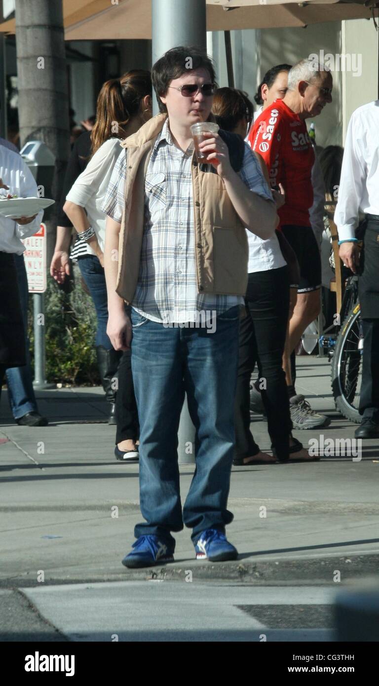 Clark Duke drinking an iced drink while out and about in Beverly Hills ...
