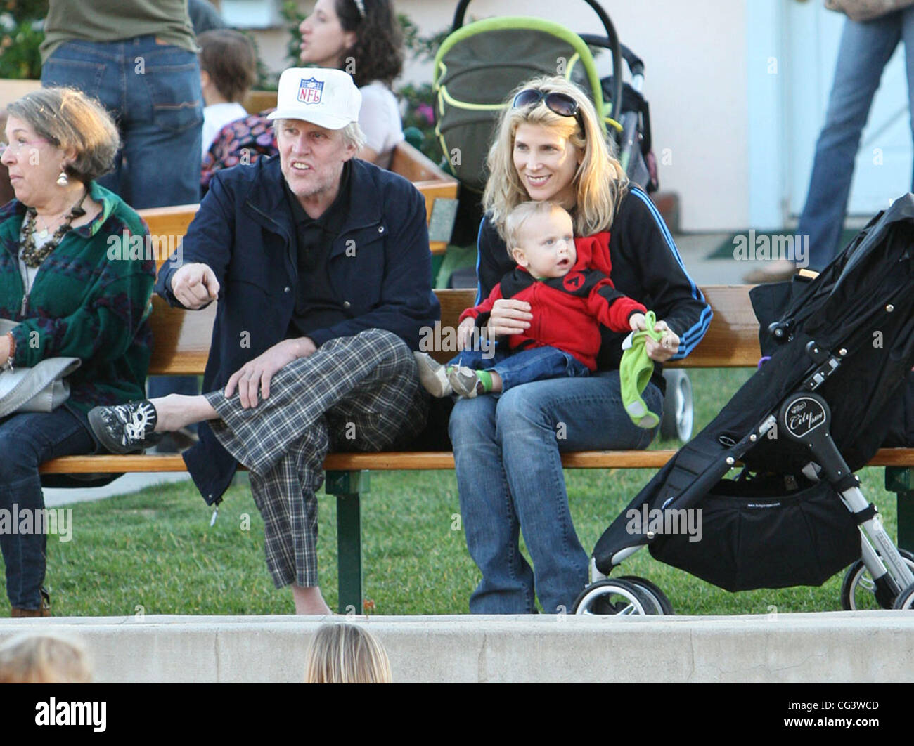 Gary Busey, Steffanie Sampson and their son Luke visit the park in ...