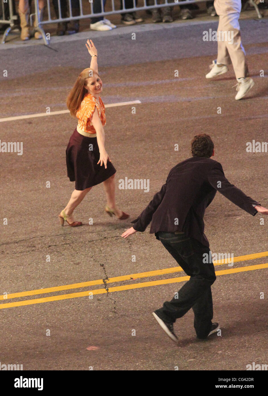 Amy Adams and Jason Segel filming a scene of Disney’s 'The Muppets' on ...