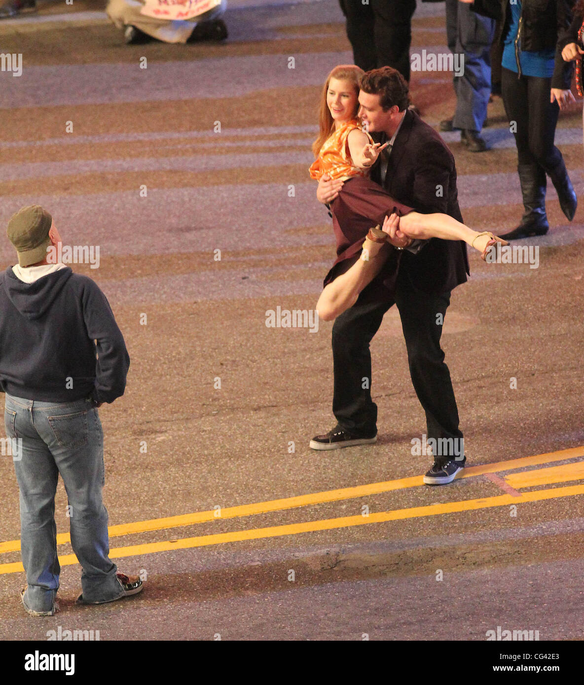 Amy Adams and Jason Segel filming a scene of Disney’s 'The Muppets' on ...