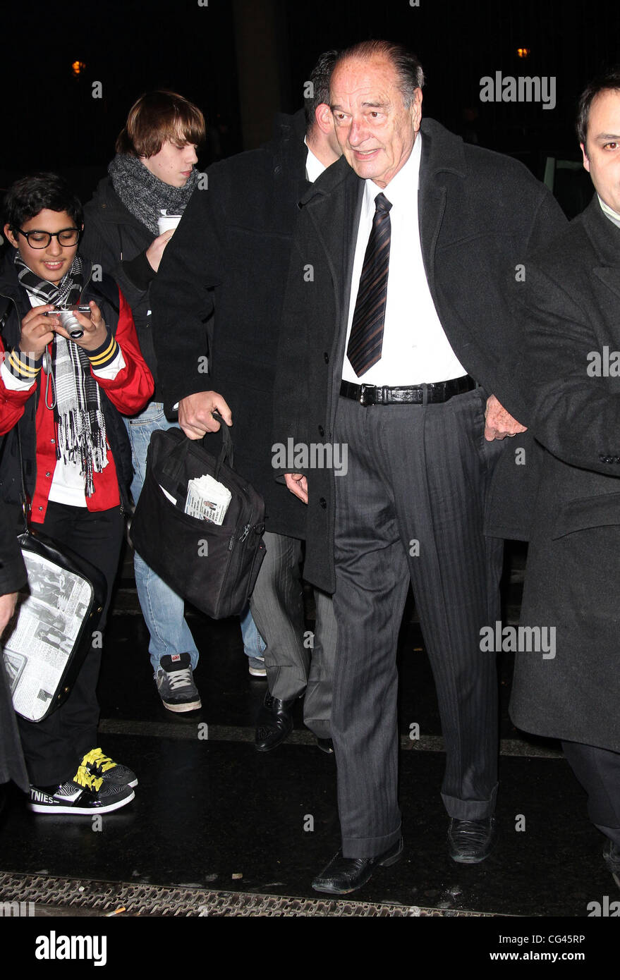 Former French President Jacques Chirac arrives at Le Meurice Hotel with ...