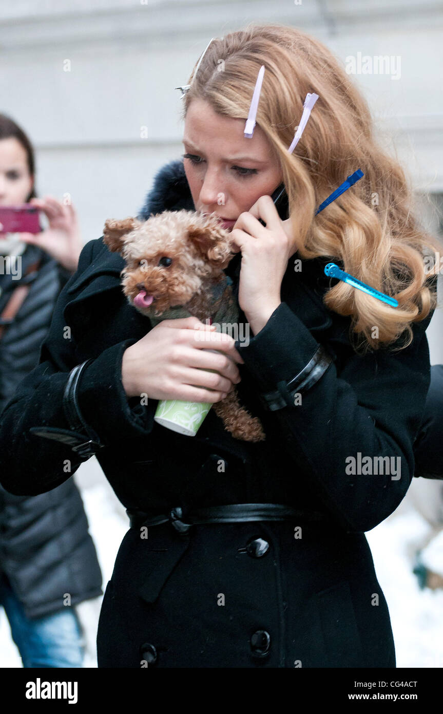 Blake Lively with her dog tucked away in her coat on the set of "Gossip ...