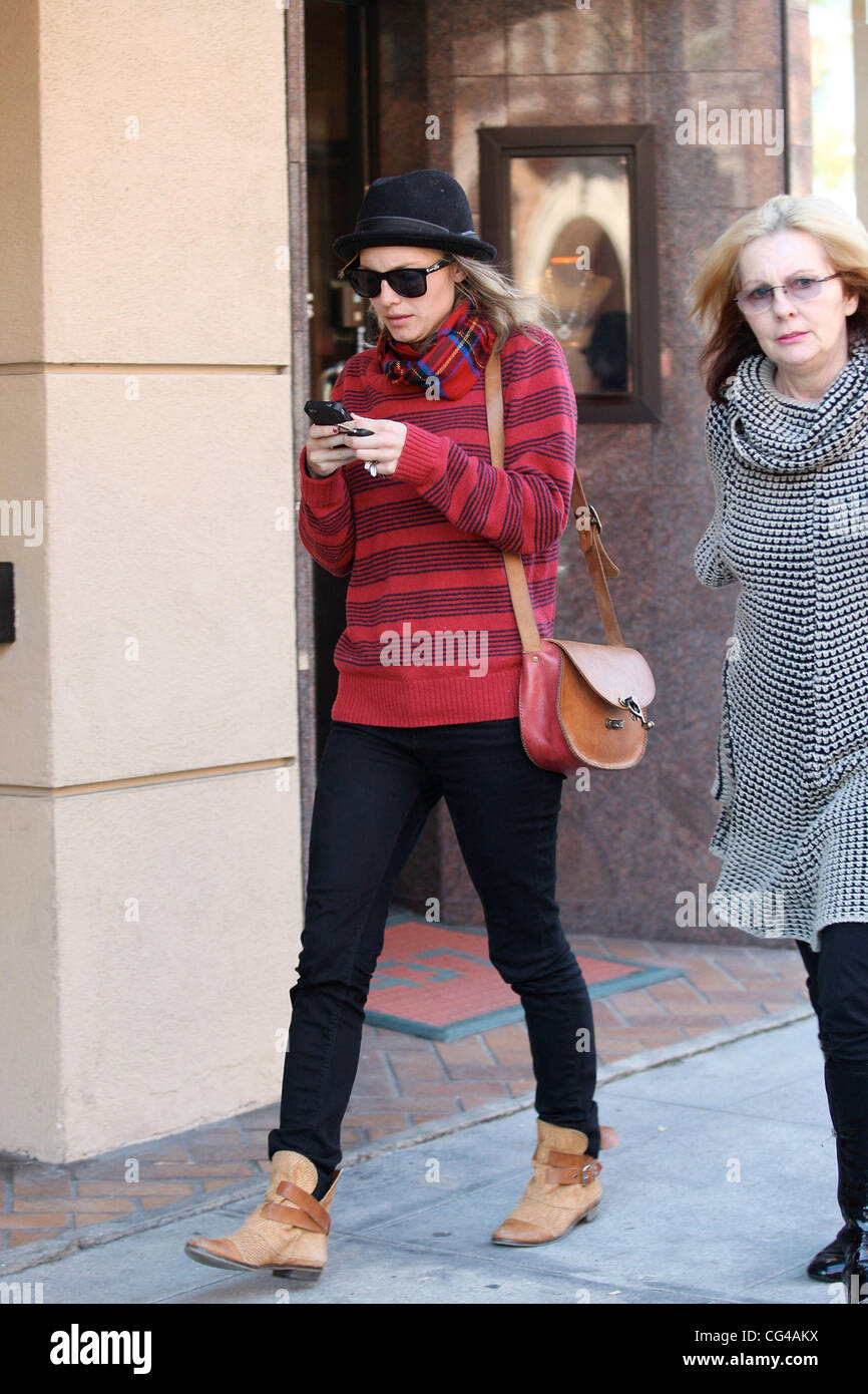 Malin Akerman texting on her cellphone as she heads to a medical ...