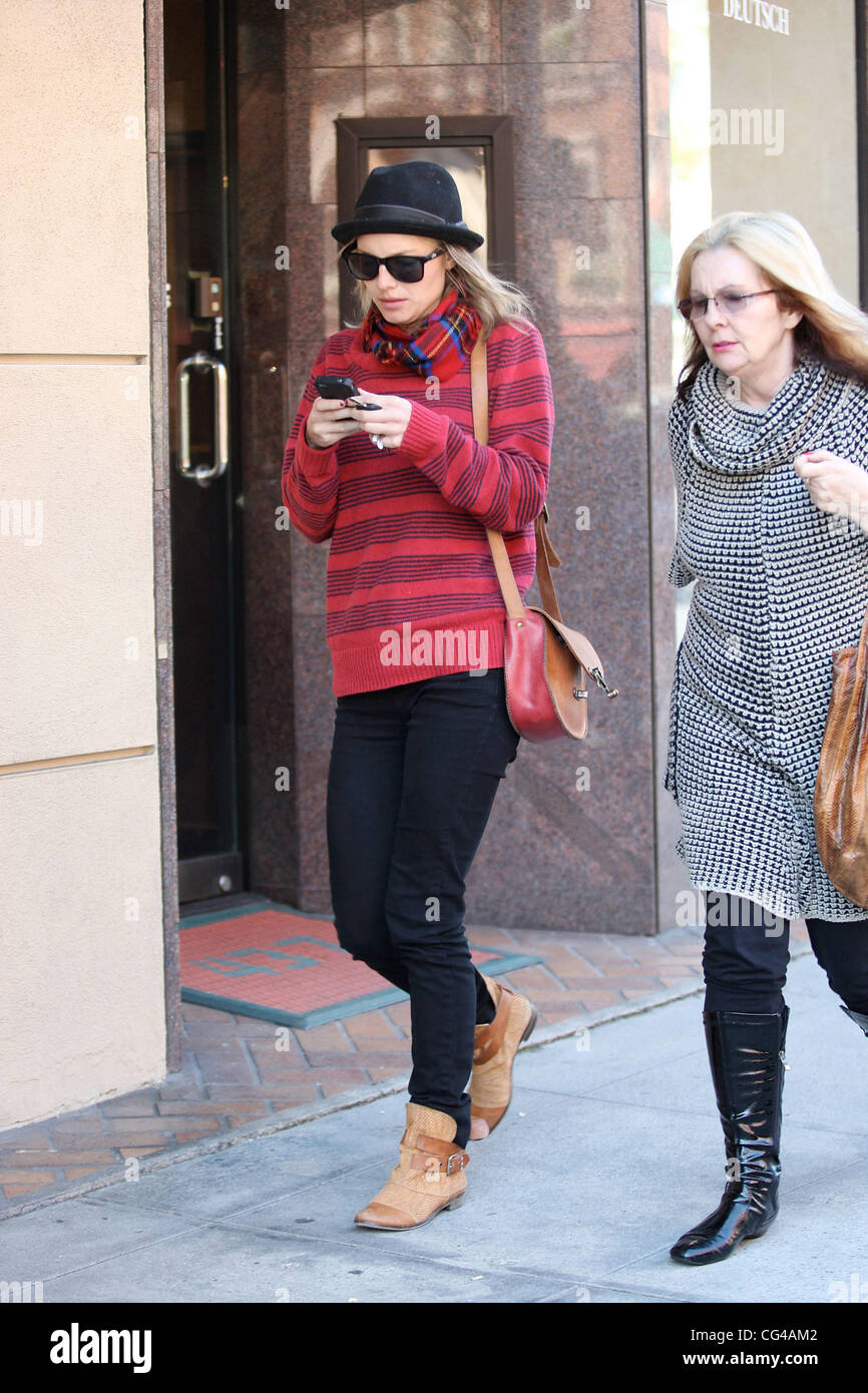 Malin Akerman texting on her cellphone as she heads to a medical ...