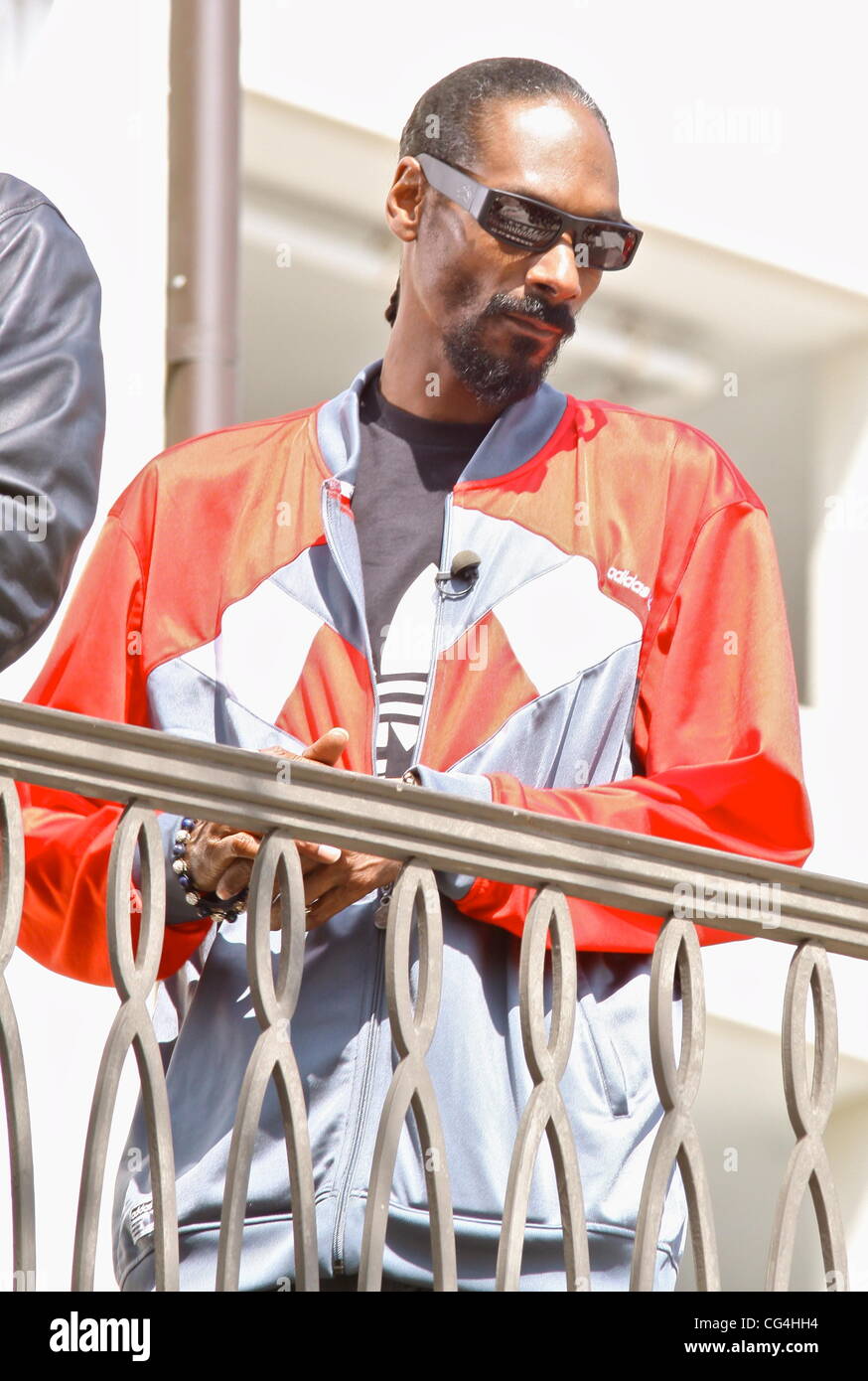 Snoop Dogg filming an interview for the entertainment television news ...