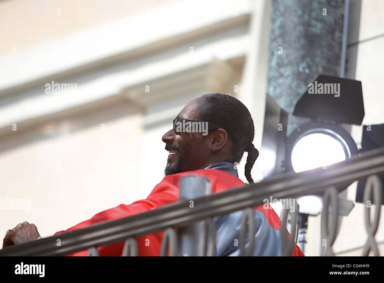 Snoop Dogg filming an interview for the entertainment television news ...