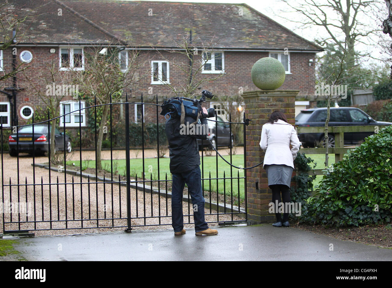 ITN news reporters outside the house of Sky Sports presenter Richard ...