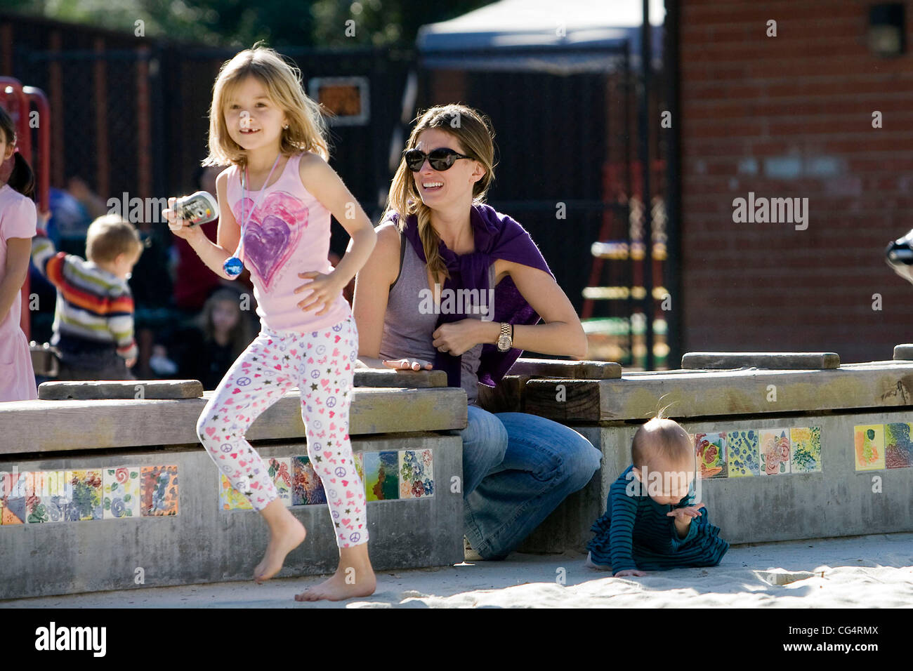 Rhea Durham and her daughters Ella and Margaret Grace play at Coldwater ...