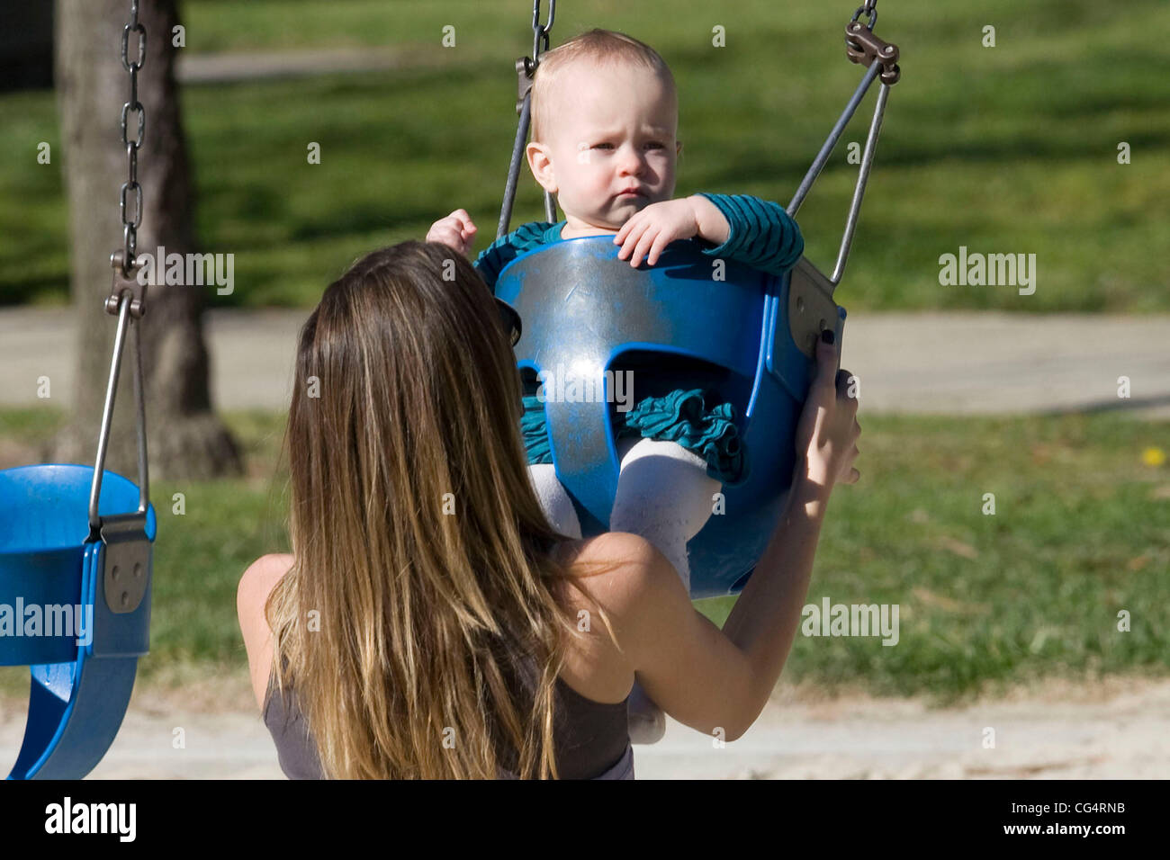 Rhea Durham and her daughter Margaret Grace play at Coldwater Park ...