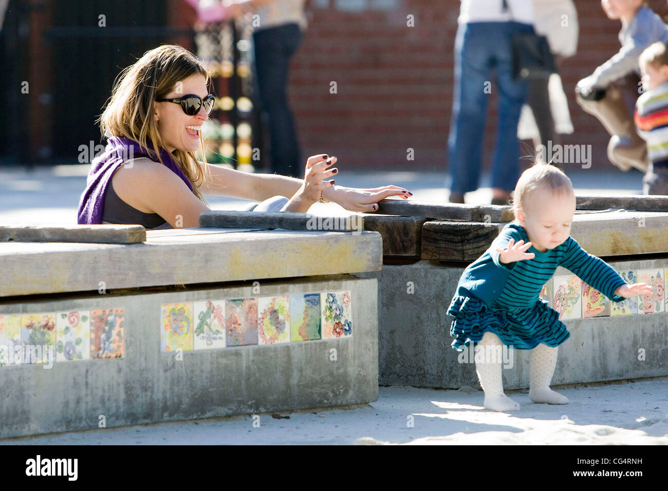 Rhea Durham and her daughter Margaret Grace play at Coldwater Park for ...