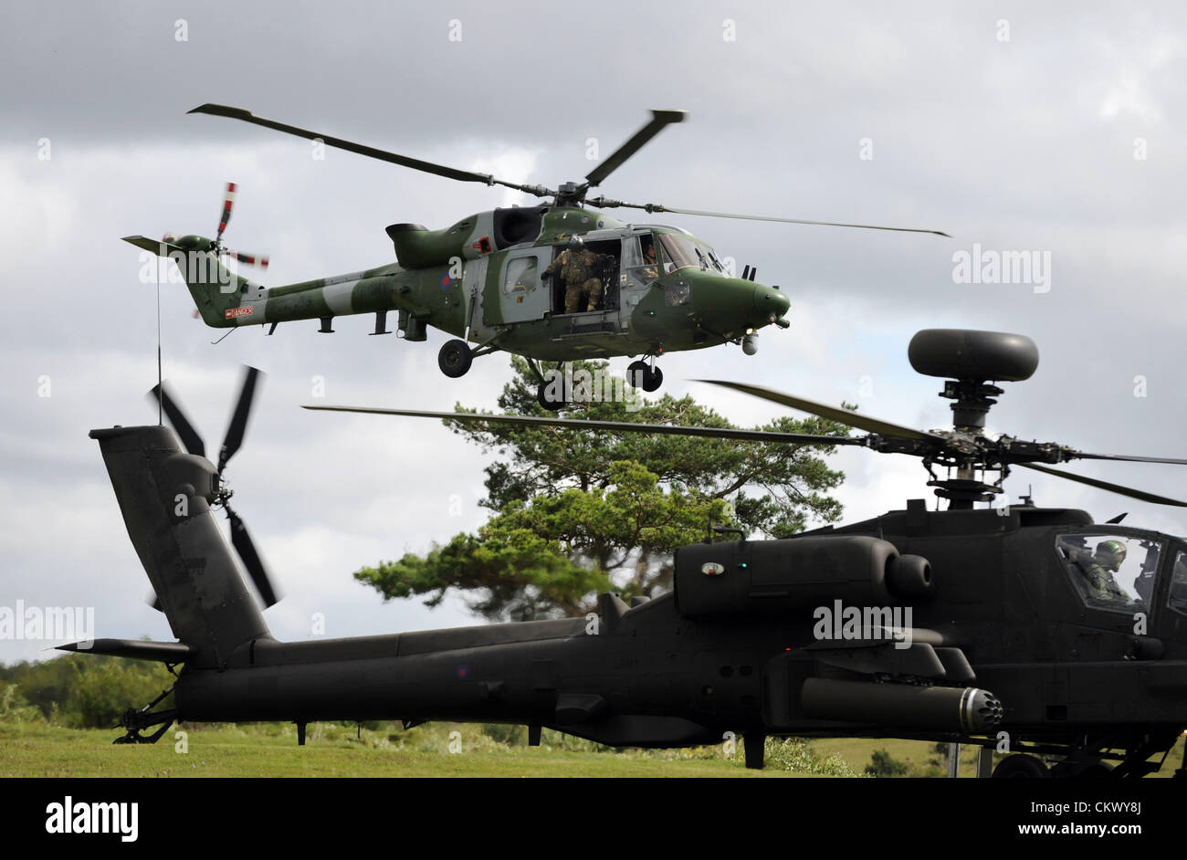 Lynx helicopter and an Apache gunship helicopter Stock Photo - Alamy