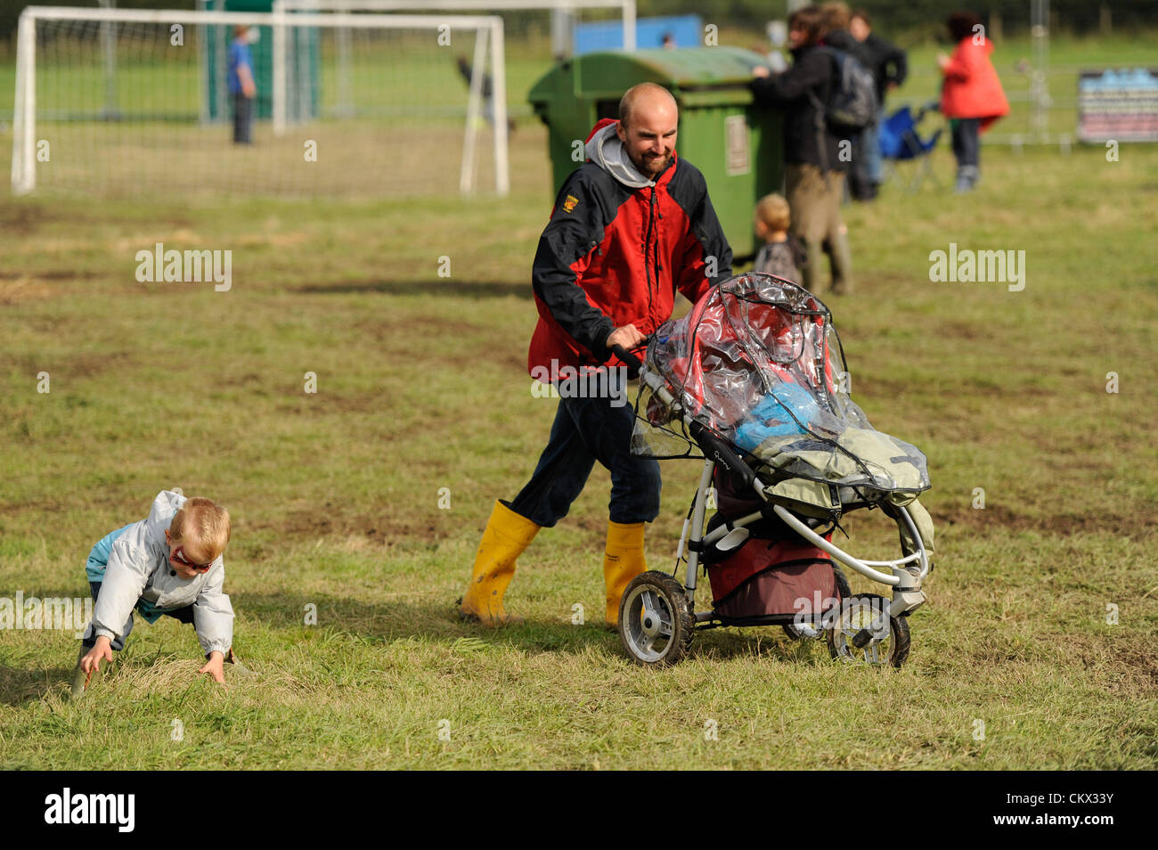 A 'festival dad' pushes a buggy. Saturday Aug 25 2012 The Big Tribute ...