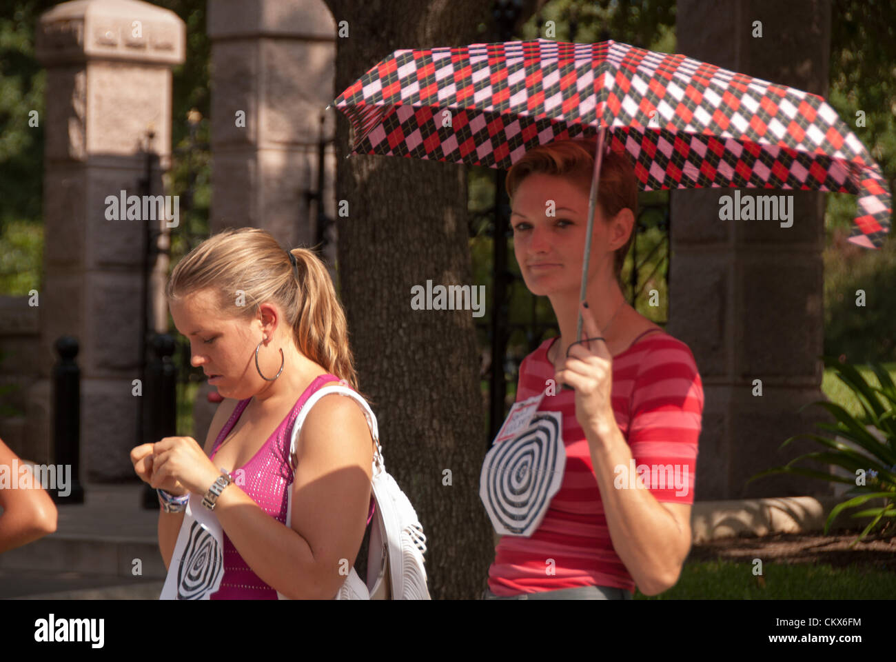 25 August 2012 Austin, Texas, USA - Rachel Ragan, with umbrella ...