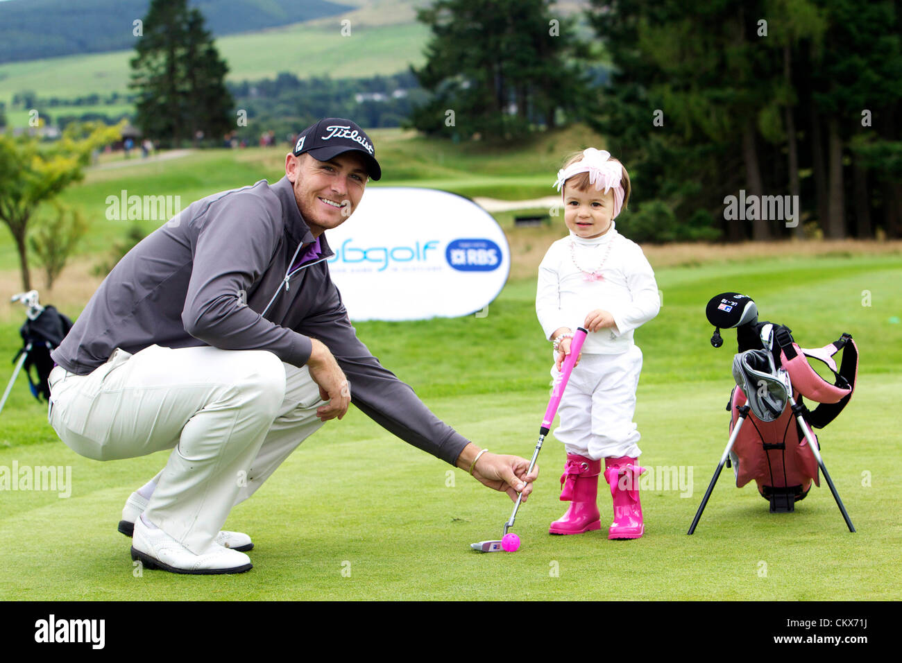 26th Aug 2012. Gleneagles, Scotland. Scotland's Lloyd Saltman with 2 yr ...