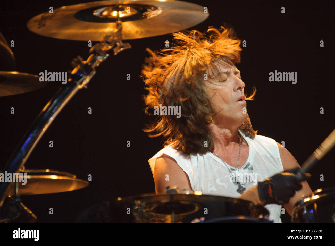 LINCOLN, CA – August 25: Bryan Hitt with REO Speedwagon performs at ...