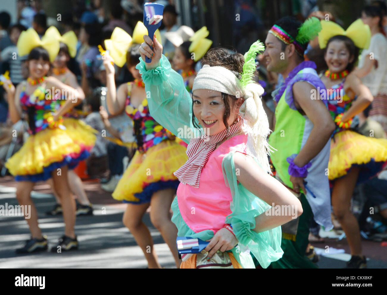August 26, 2012, Tokyo, Japan - Performers in colorful costumes dance ...