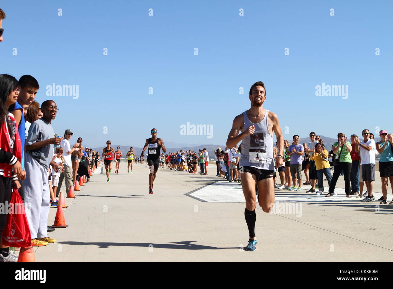 26th Aug 2012. Runner Andrew Acosta 24 from Los Angeles California wins ...