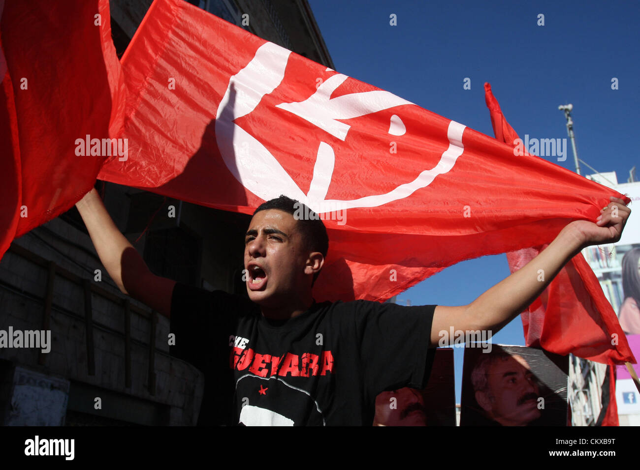 Ramallah, West Bank, Palestinian Territory - A Palestinian supporter of ...