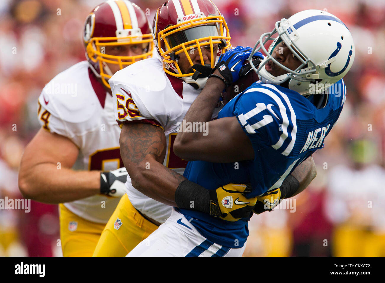 Redskins LB Perry Riley (56) tackles Colts WR Donnie Avery (11) during ...
