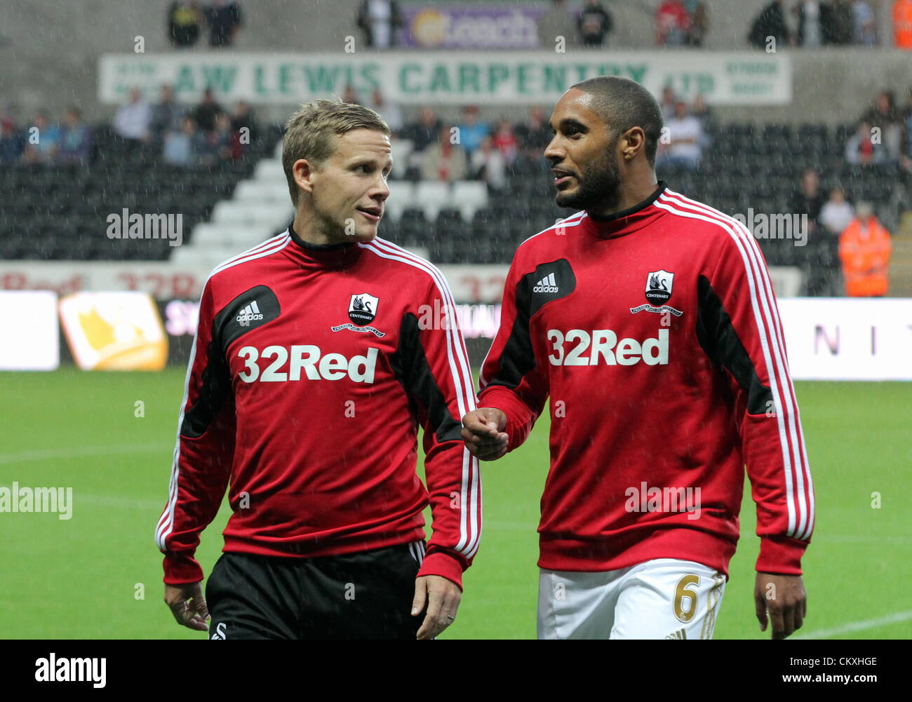 Liberty Stadium, Swansea, UK. 28th Aug 2012. Pictured L-R: Mark Gower ...