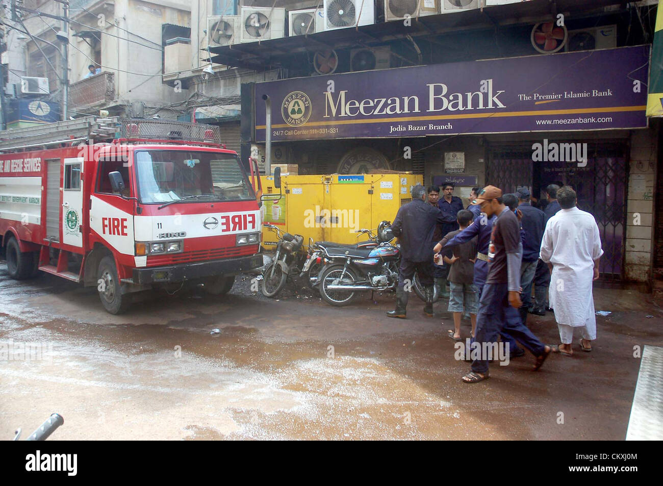 KARACHI, PAKISTAN, AUG 29: Firefighters extinguish fire on burning ...