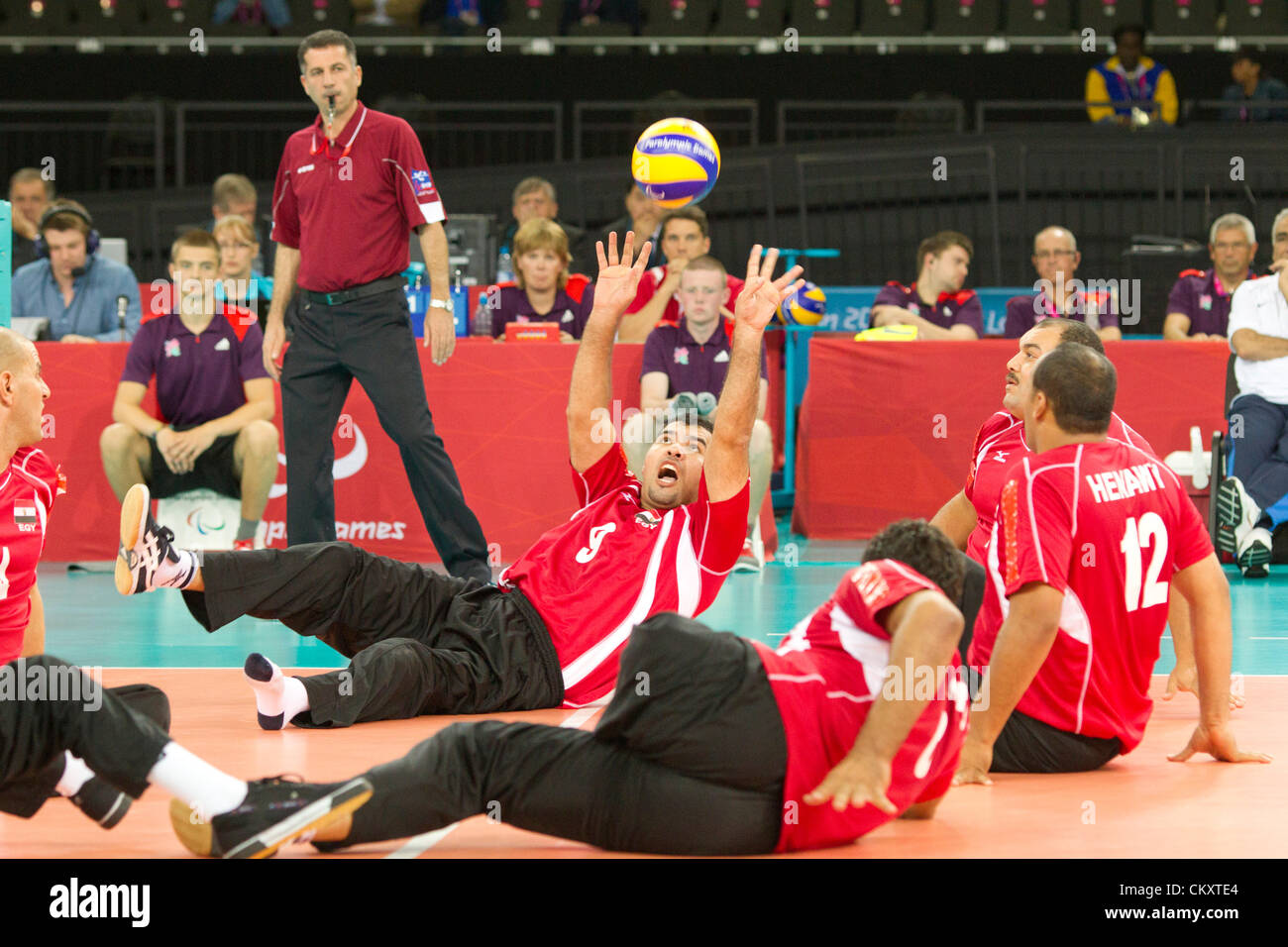 LMen's sitting volleyball game between Morocco (white) and Egypt (red ...
