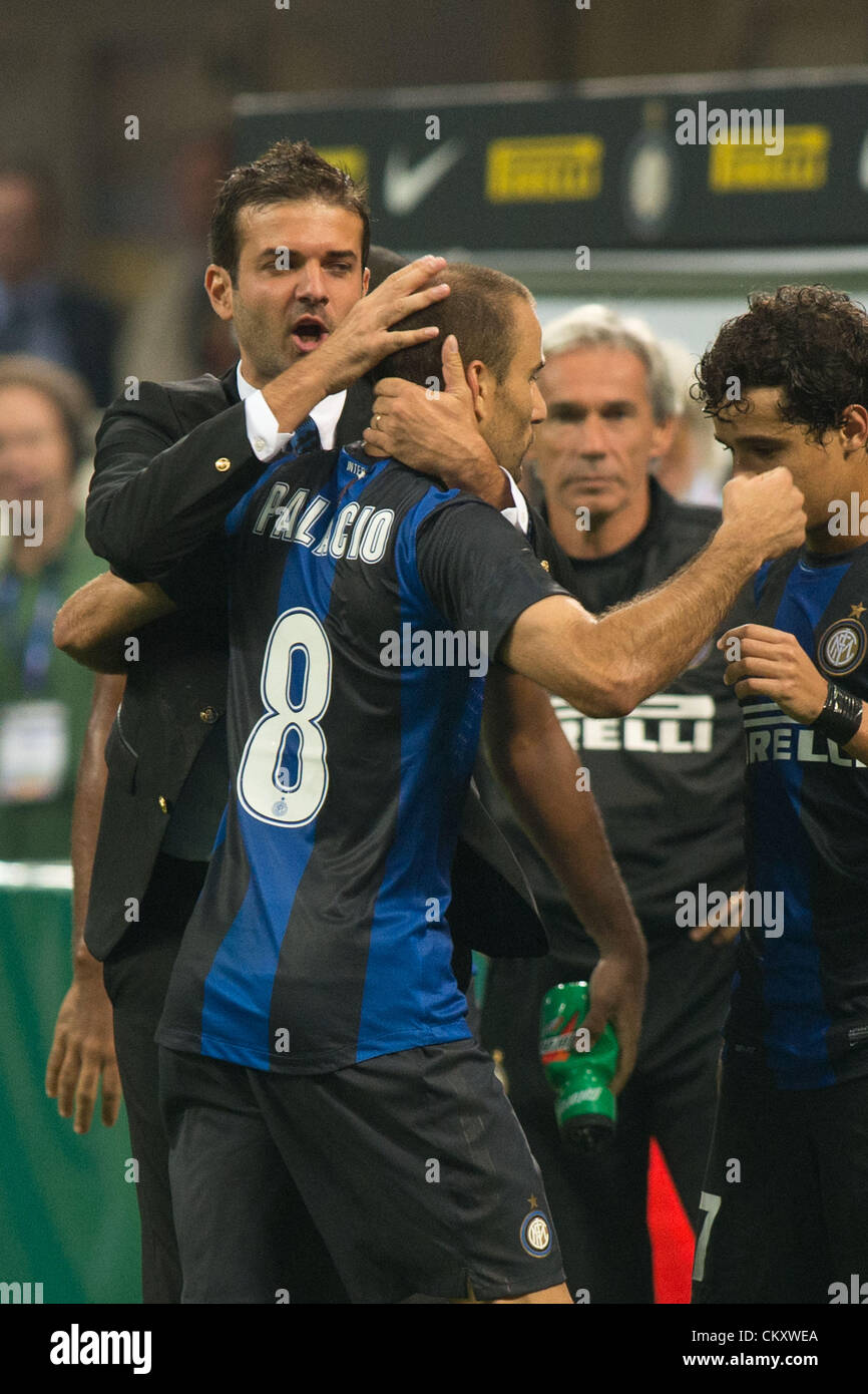 Milan, Italy. 30th Aug 2012. (L-R) Andrea Stramaccioni, Rodrigo Palacio ...