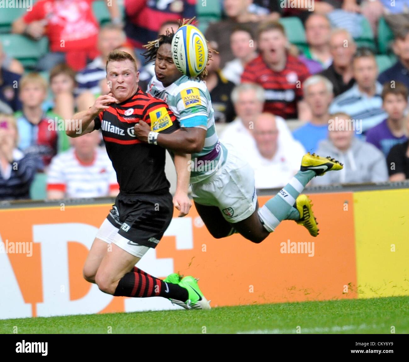 01.09.2012. London, England. Chris Ashton of Saracens tackled by ...