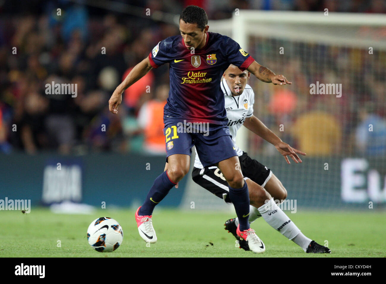 02.09.2012. Barcelona, Spain. Barcelona's Adriano and Valencia's ...