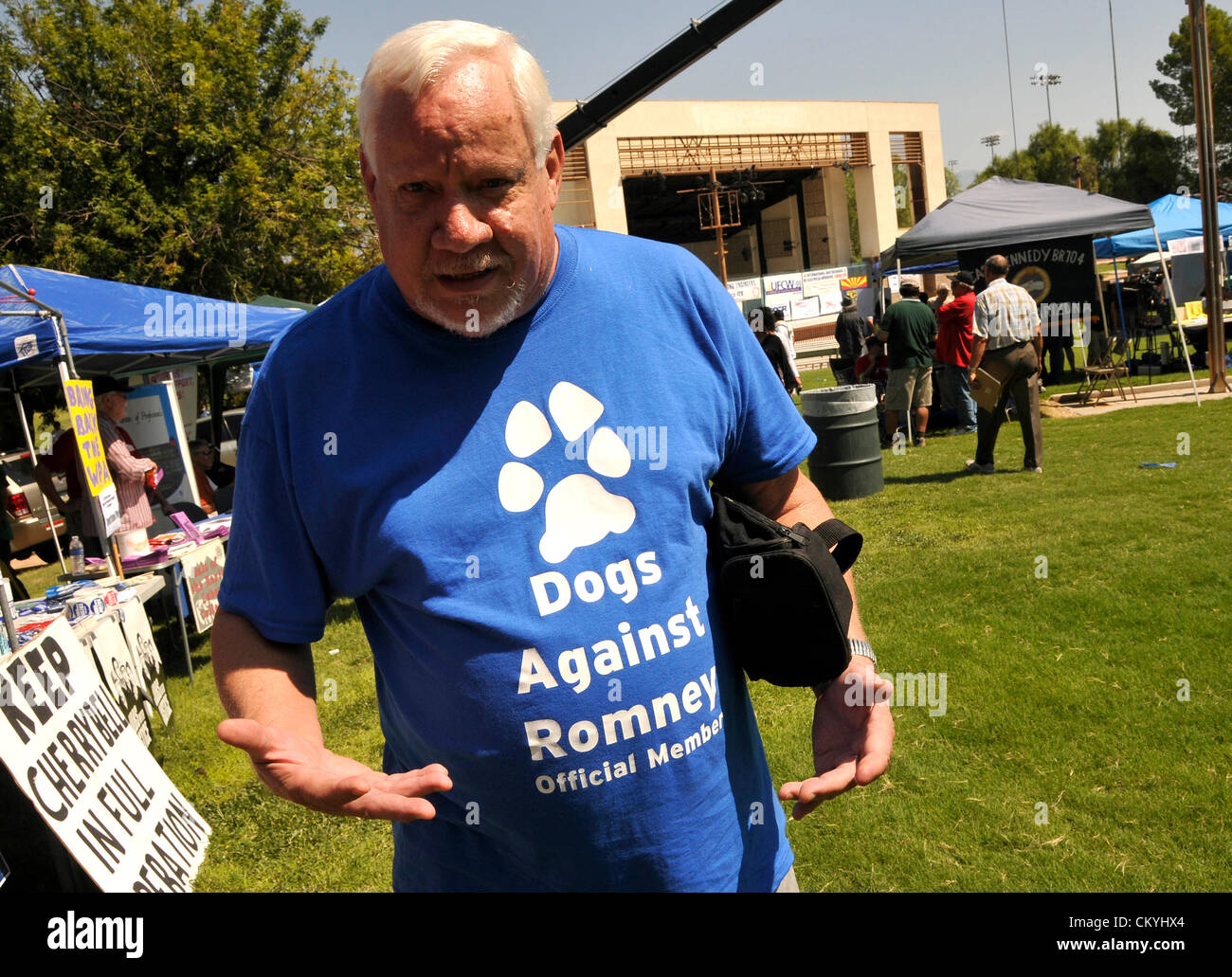 John Yoakum wears a "Dogs Against Romney" shirt to express his reaction ...