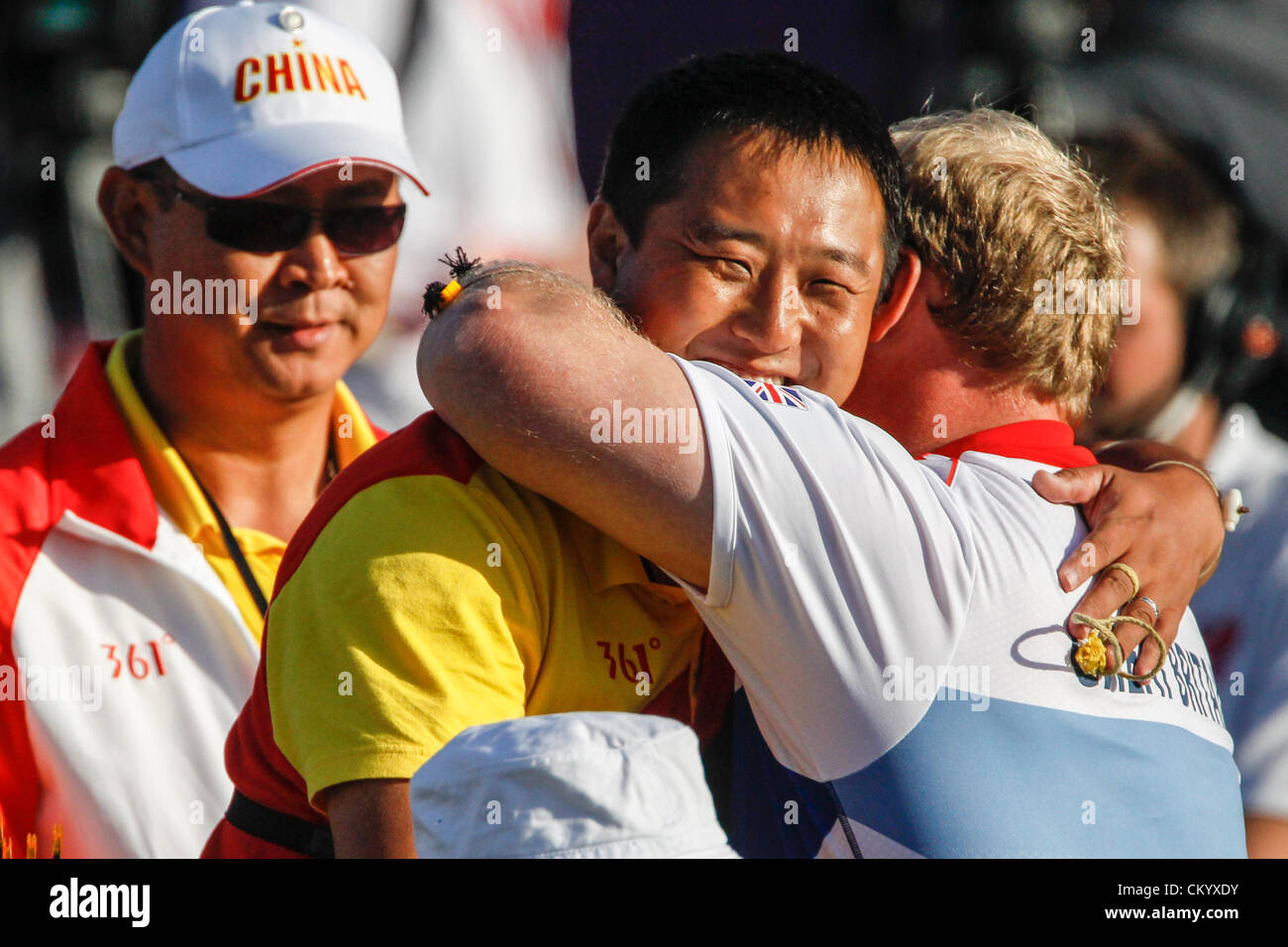 05.09.2012 London, England. Kenny ALLEN (GBR) congratulates DONG Zhi ...
