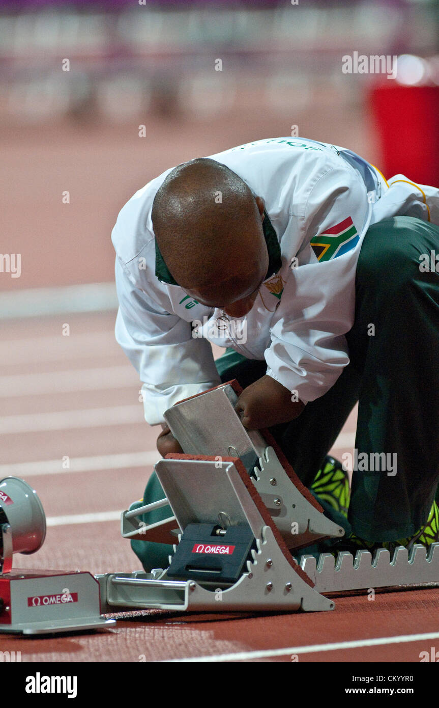 Radebe Samkelo adjusts his blocks before the final of the Men's 4x100m ...