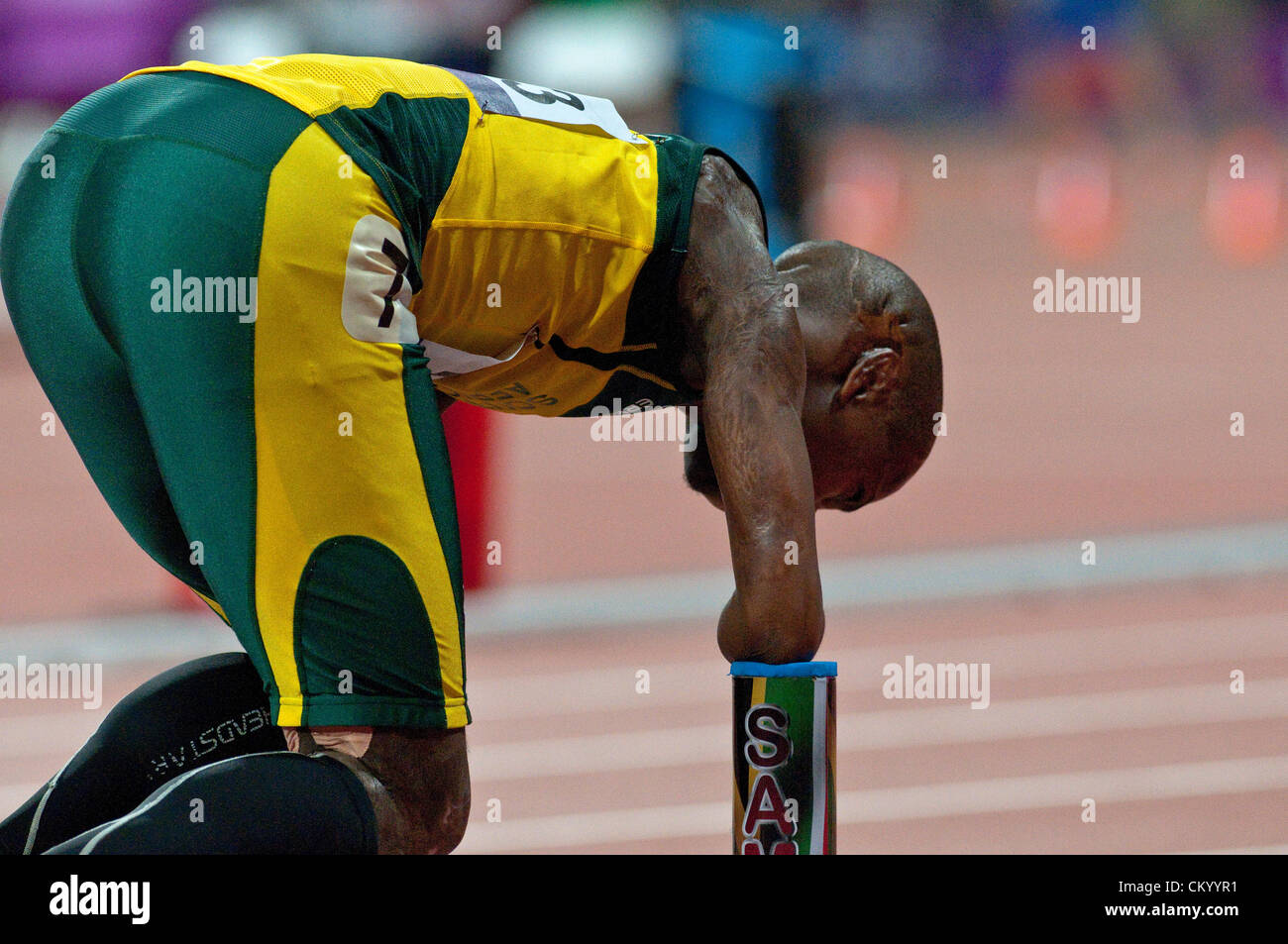 Radebe Samkelo adjusts his blocks before the final of the Men's 4x100m ...