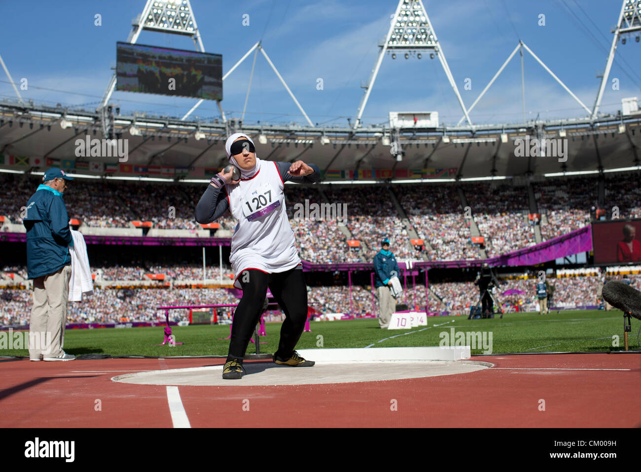 Iran's Hajar Taktaz throws the shot put in the women's F11/12 class at ...
