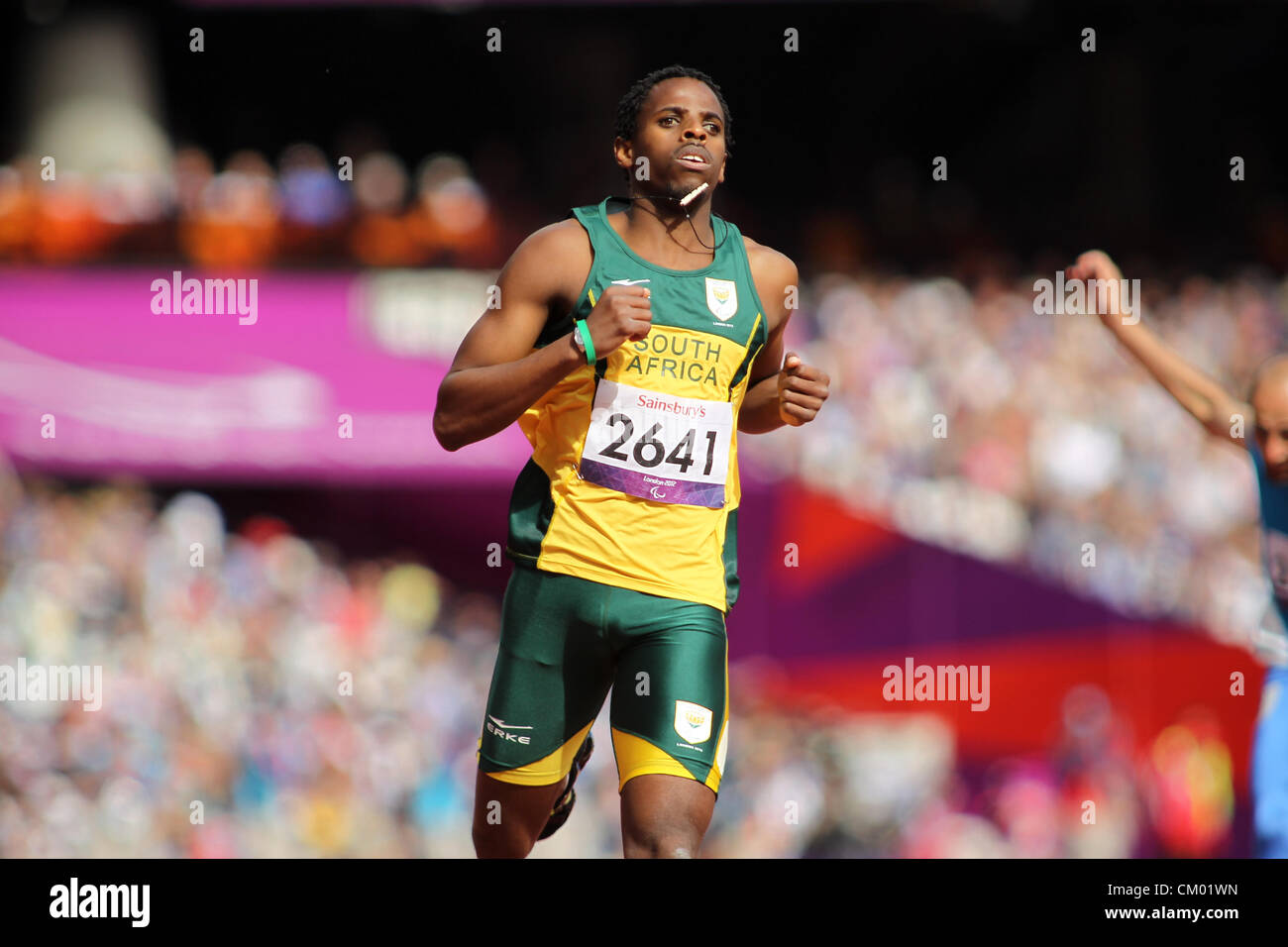6.09.2012 London, England. Jonathan Ntutu (RSA) crosses the line in the ...
