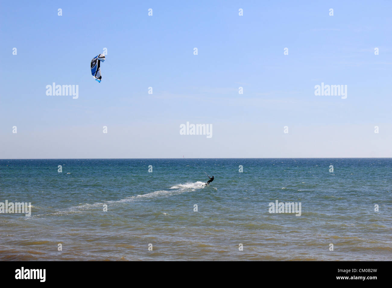 Goring beach near Worthing, West Sussex, England, UK. A lone kite ...