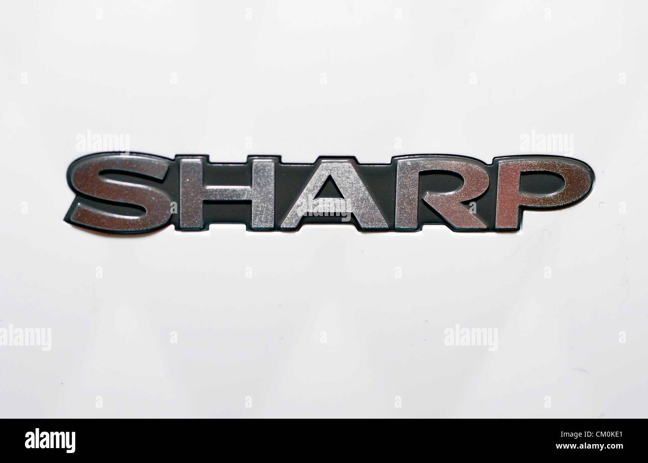 The Sharp Corp. logo is seen at an electronics store, in Tokyo ...